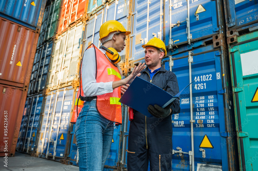 The Problem with Two foreman man & woman worker working checking at ...