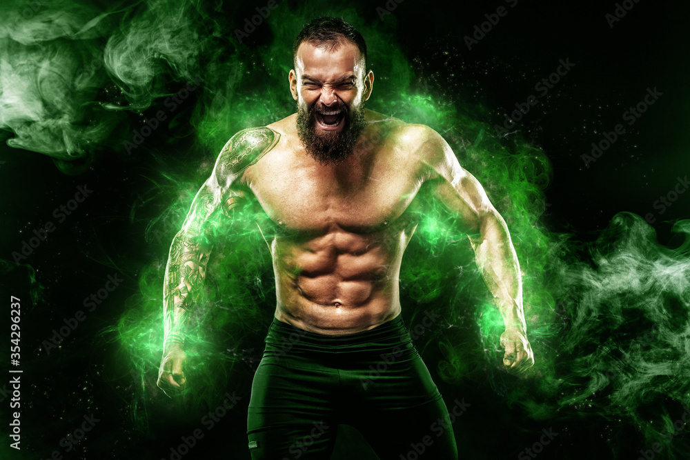 Athlete in green energy lights. Sportsman muay thai boxer celebrating ...
