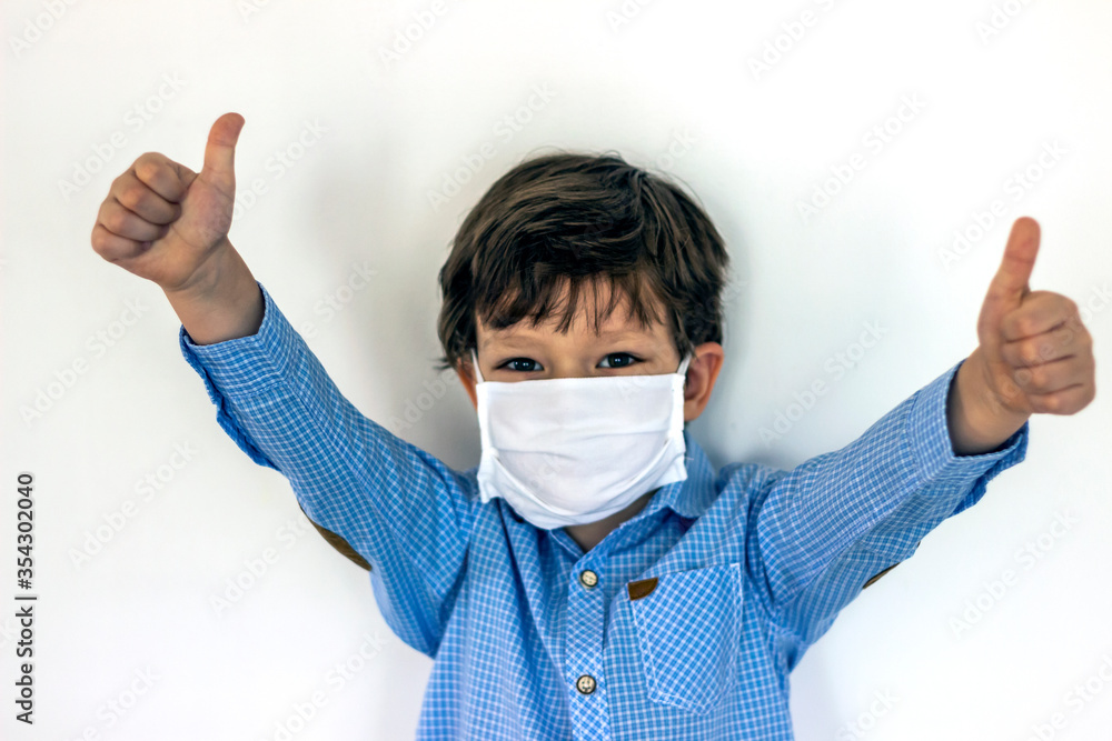 Little Caucasian children boy wearing medical mask protection ...