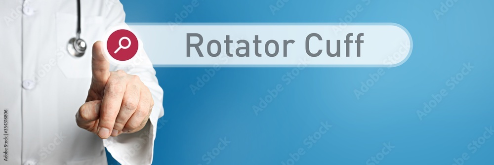 Zdjęcie Stock: Rotator Cuff. Doctor in smock points with his finger to ...