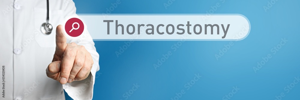 Thoracostomy. Doctor in smock points with his finger to a search box ...