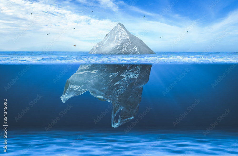 Global warming in the sea. Plastic bag iceberg with the bird ...