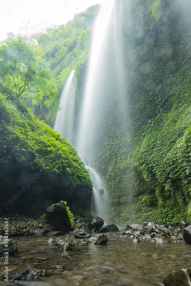 (Selective focus) Stunning view of the Madikaripura Waterfalls during ...