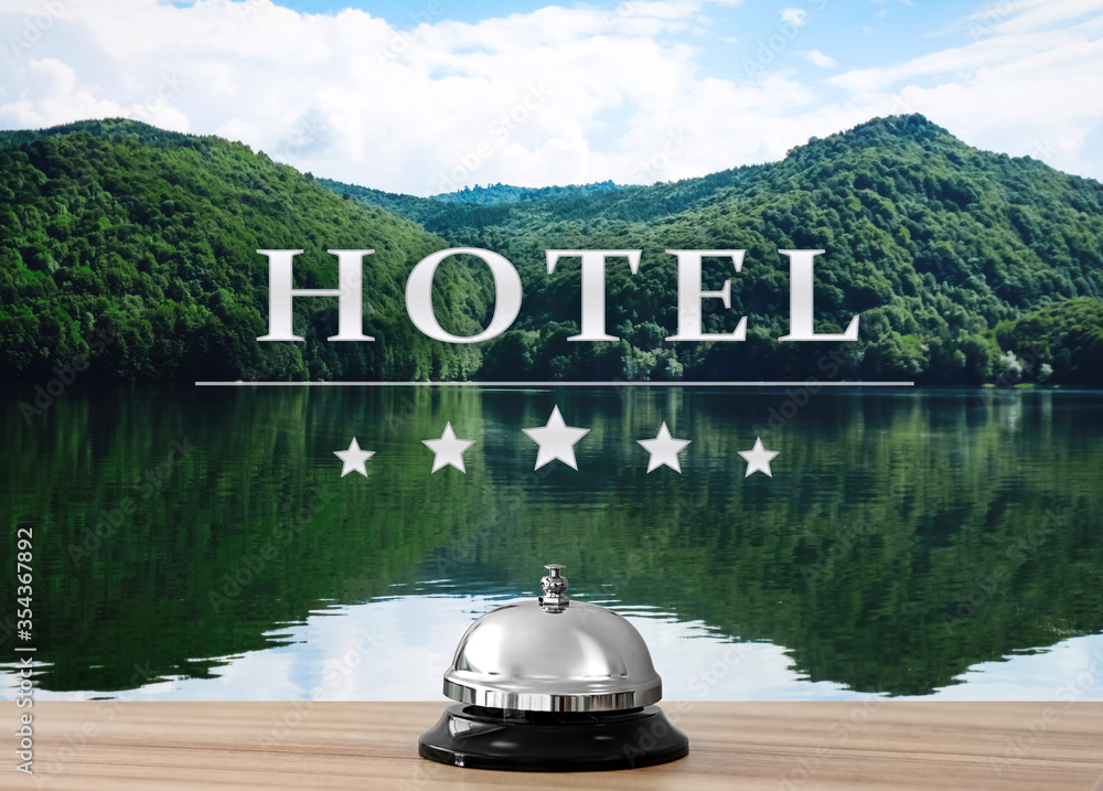 5 Star hotel. Reception desk with service bell and picturesque ...