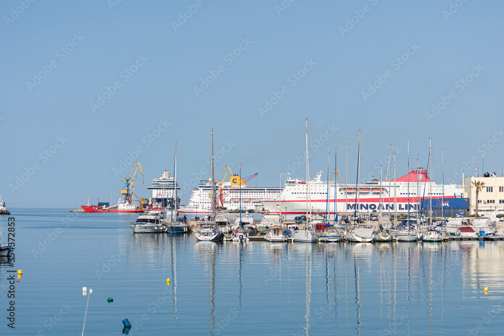 Crete, Greece - May 01, 2019: Yachts and ferry boat in the port of ...