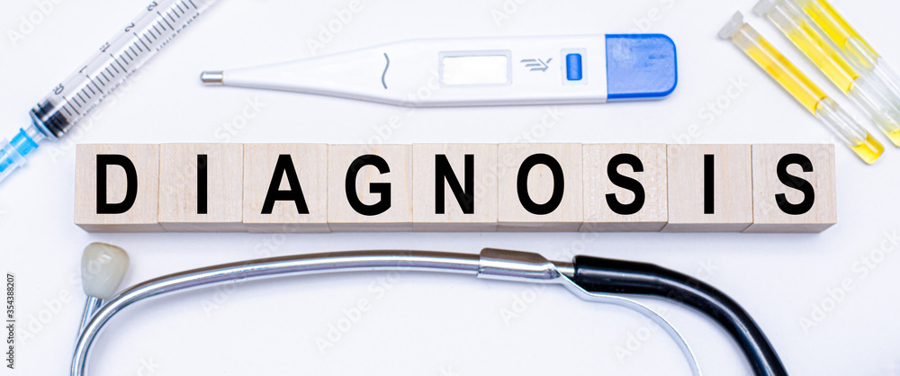 Medical concept Diagnosis cube with letters, sign with wooden cubes ...