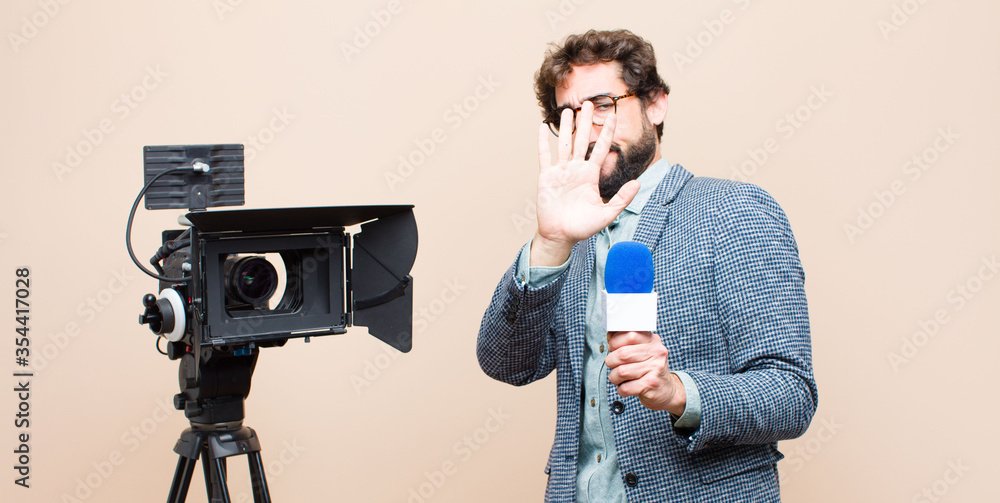 television presenter looking serious, stern, displeased and angry ...
