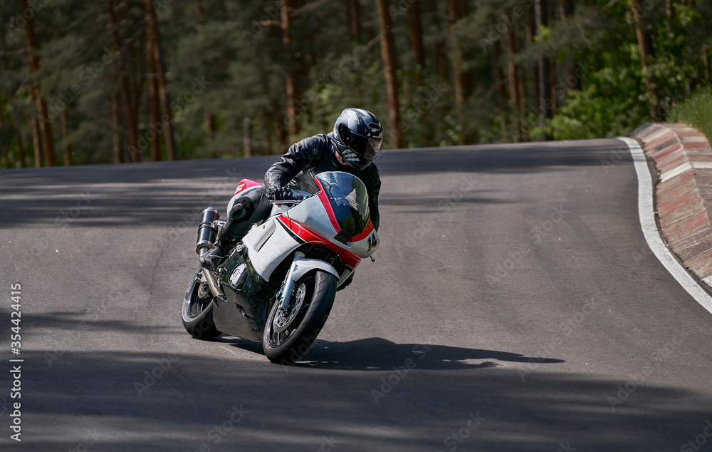 motorcycles standing in the row on asphalt closeup. Moto racing. MotoGP ...
