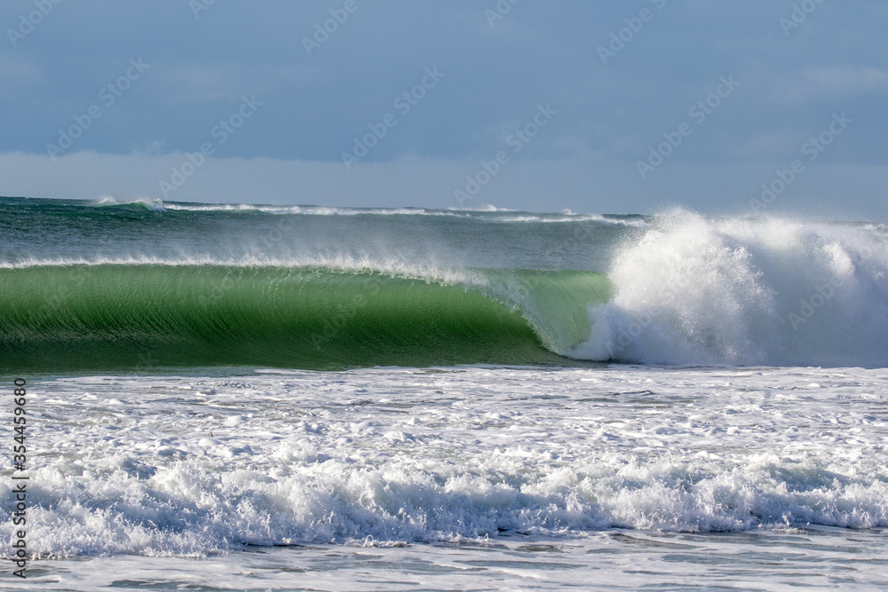 Waves breaking in Japan. The Pacific Ocean & its waves often generated ...