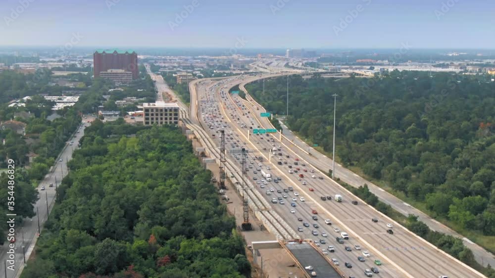 Aerial: Rush hour traffic on Interstate 610 in the Uptown District ...