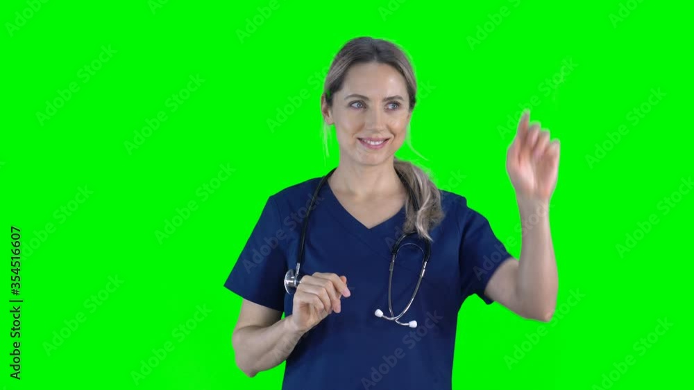 4K female nurse doctor on green screen isolated with chroma key. Woman ...