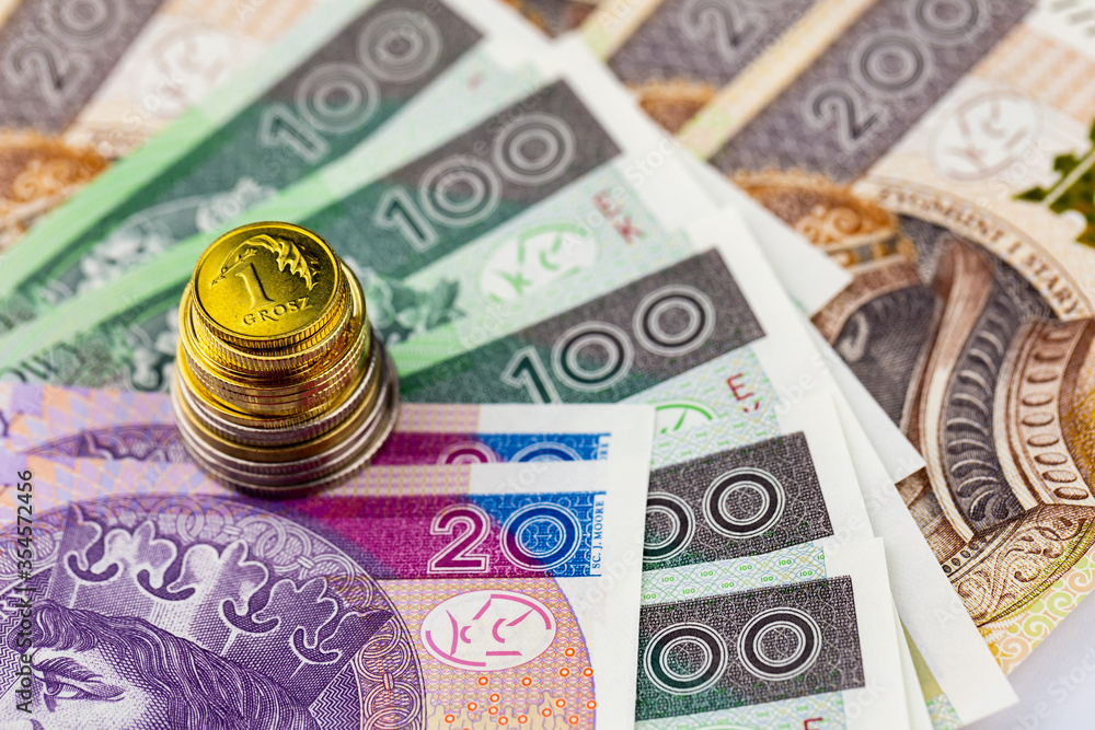 Several examples of Polish bank notes and coins Stock Photo | Adobe Stock