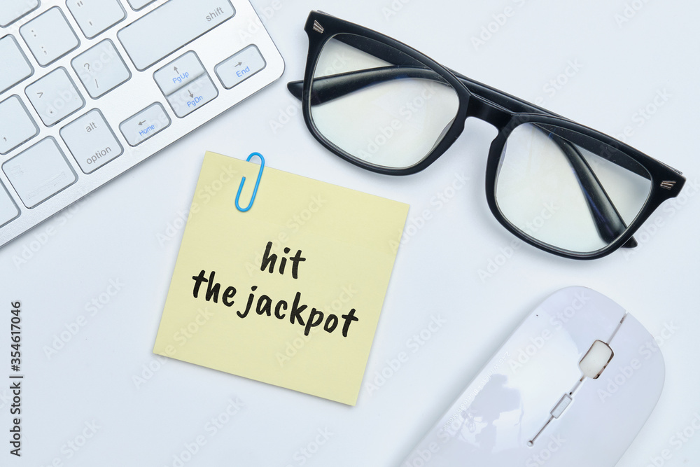hit the jackpot - english money idiom hand lettering Stock Photo ...