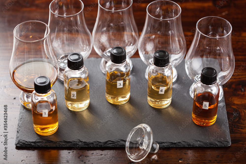 tasting bottles and glasses of whisky spirit brandy cognac. tasting at ...