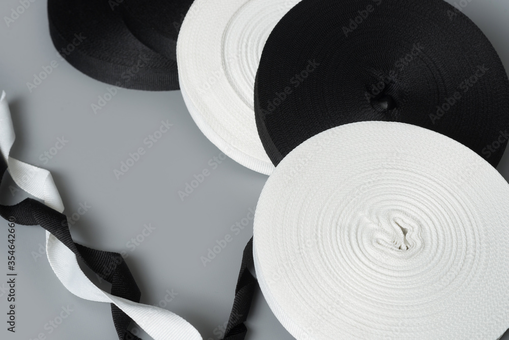 rolls of textile tape on gray background. color tape production. Stock ...