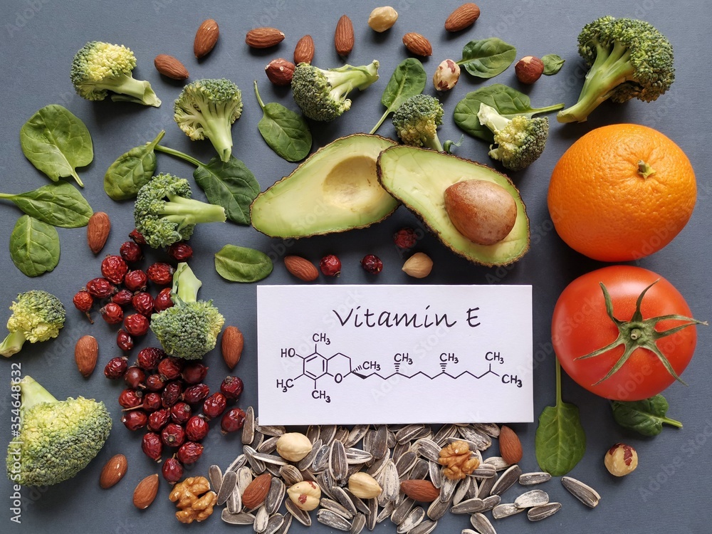 Food rich in vitamin E with structural chemical formula of vitamin E ...