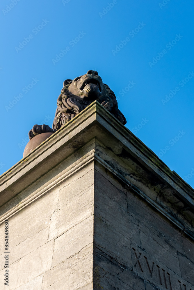 Detail of the cast iron statue on the famous Lion’s Mound monument in ...