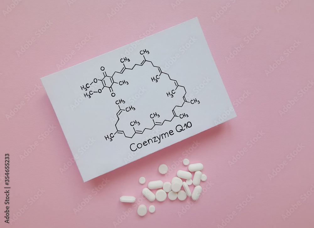 Structural chemical formula of Coenzyme Q10 molecule with tablets and ...