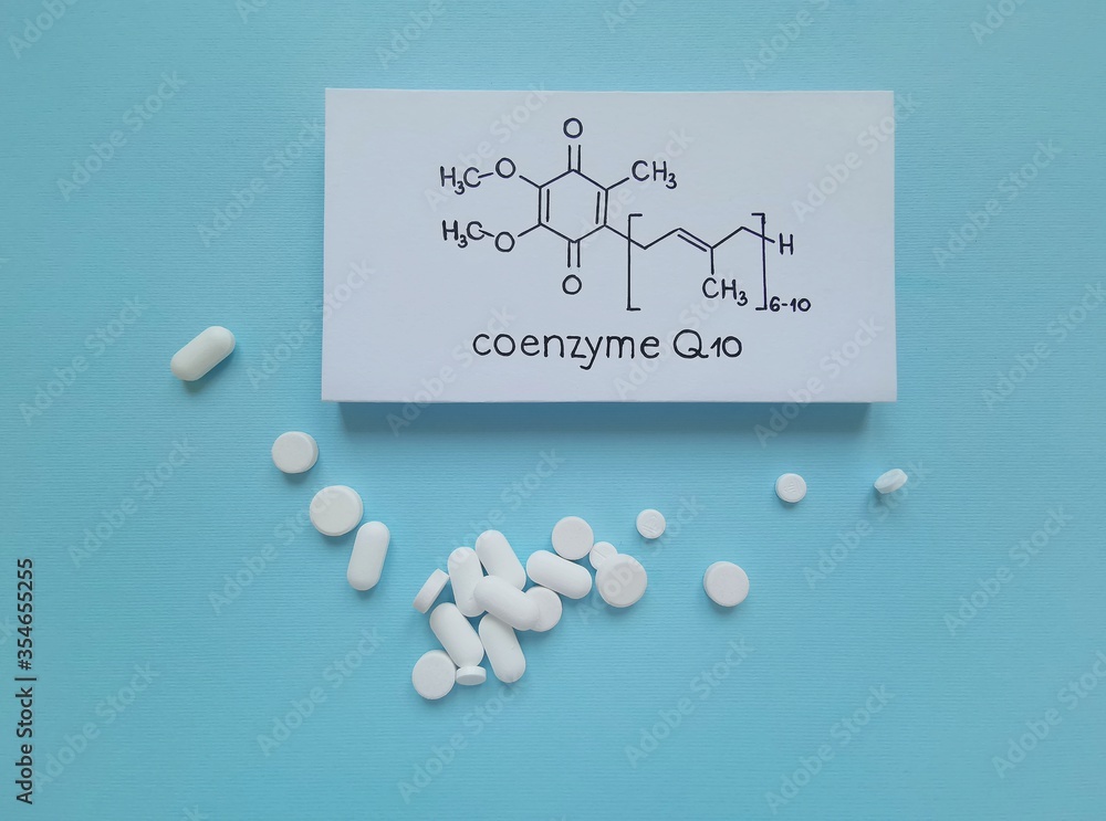 Structural chemical formula of Coenzyme Q10 molecule with tablets and ...