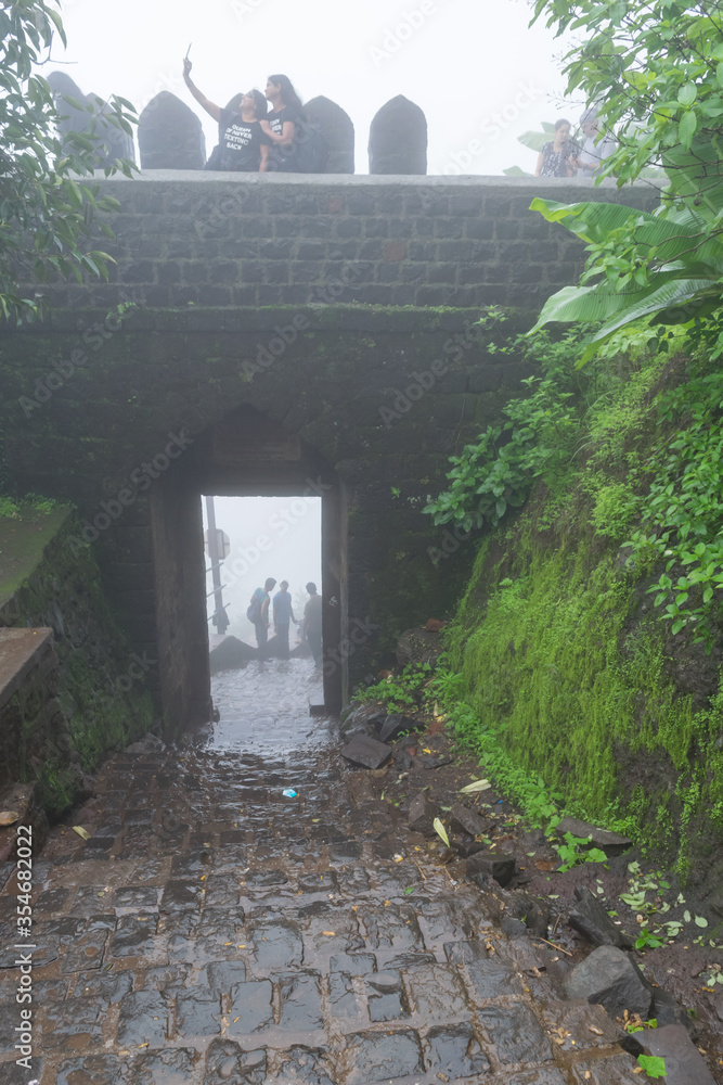 Monsoon trek at Sinhagad Fort, near Pune in India. Stock Photo | Adobe ...