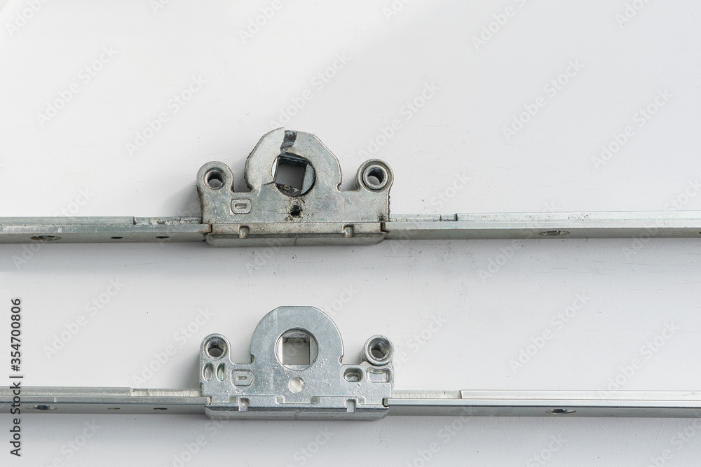 Old broken swing-out mechanism of a metal-plastic window Stock Photo ...