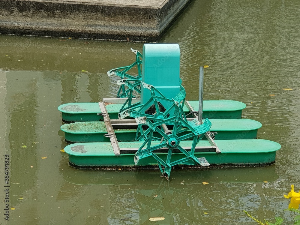 Mechanical compressed air and water suction aerator installed in public ...