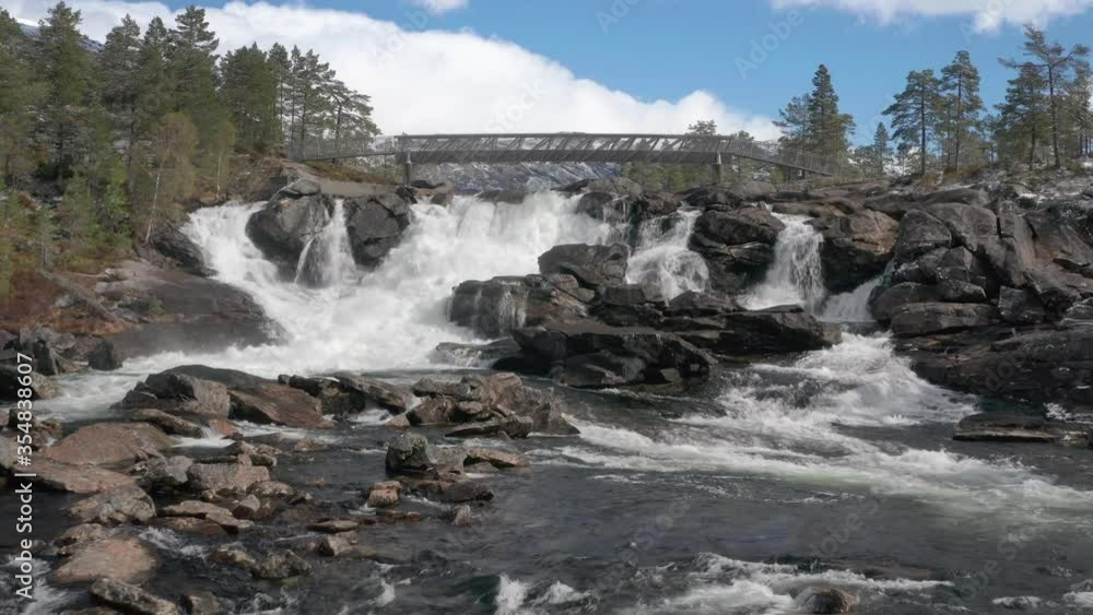 Likholefossen waterfall on Gaula river in Norway. A turbulent mass of ...