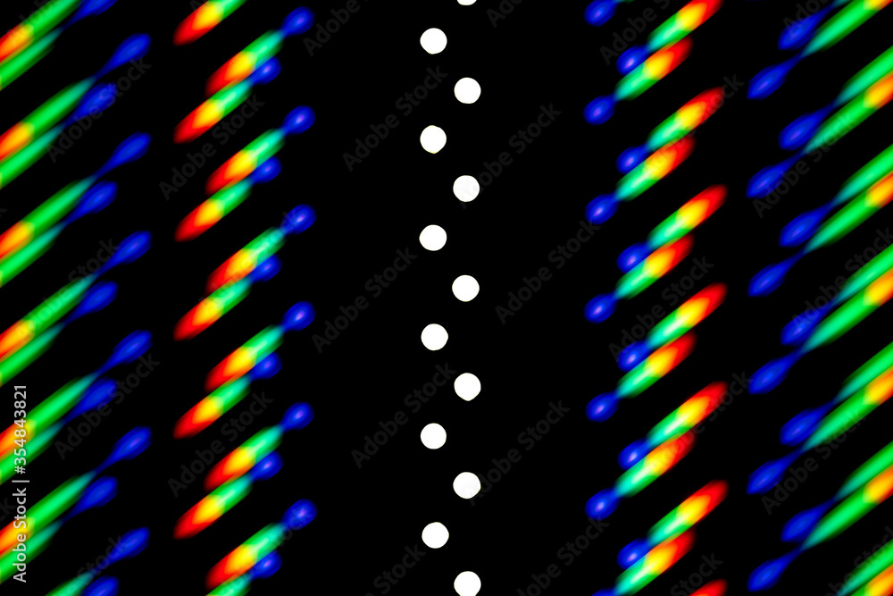 Photo of a diffraction pattern from a line of LEDs. Image was obtained ...