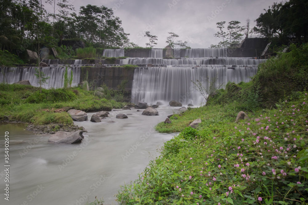 (Grojogan Watu Purbo) Watu Purbo waterfall is a multi-storey river dam ...