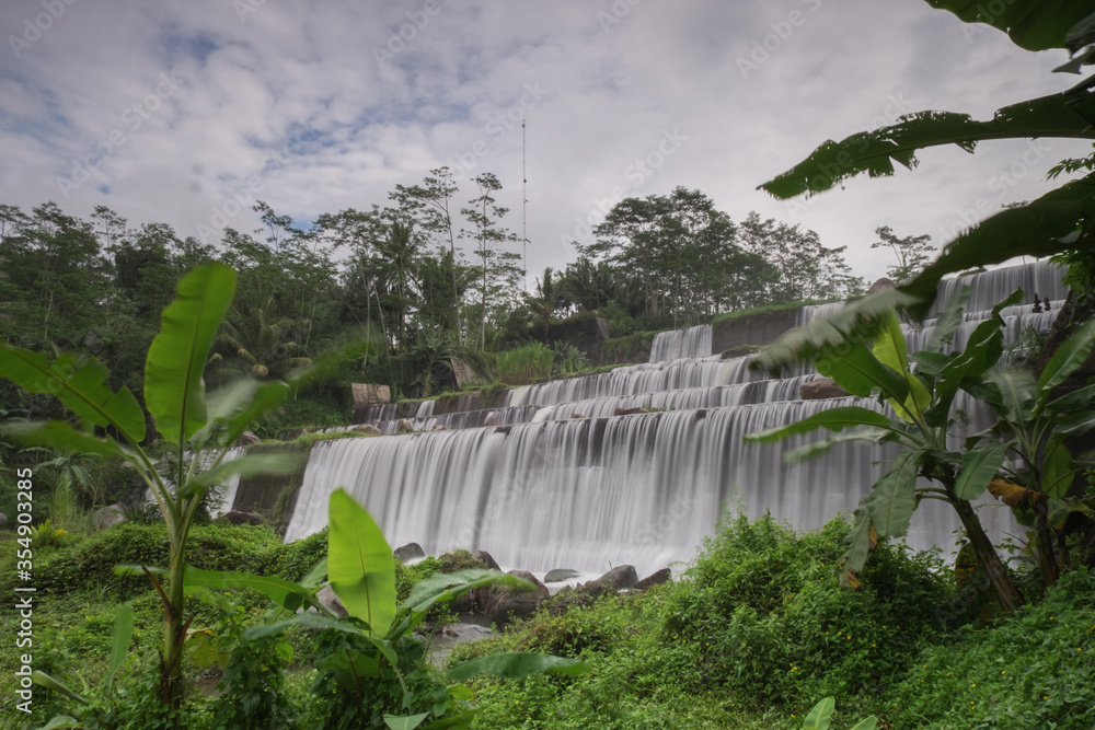 (Grojogan Watu Purbo) Watu Purbo waterfall is a multi-storey river dam ...