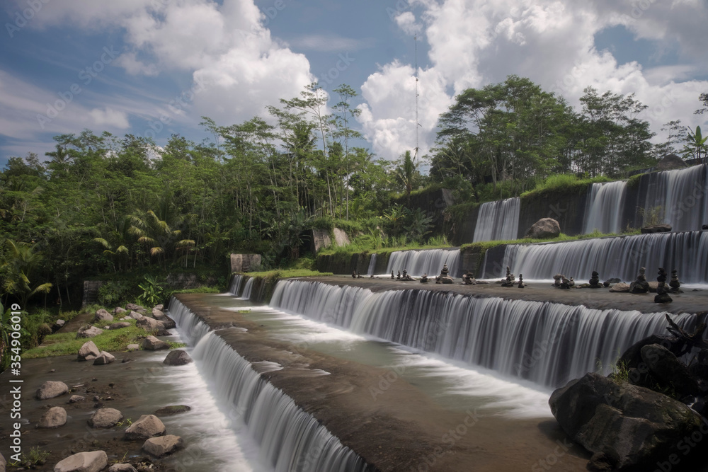 (Grojogan Watu Purbo) Watu Purbo waterfall is a multi-storey river dam ...