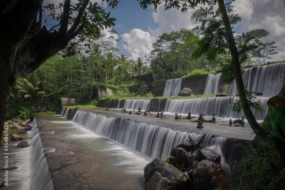 (Grojogan Watu Purbo) Watu Purbo waterfall is a multi-storey river dam ...