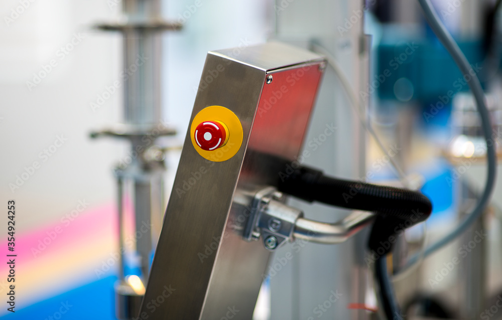 The red emergency button or stop button for Hand press. STOP Button for ...