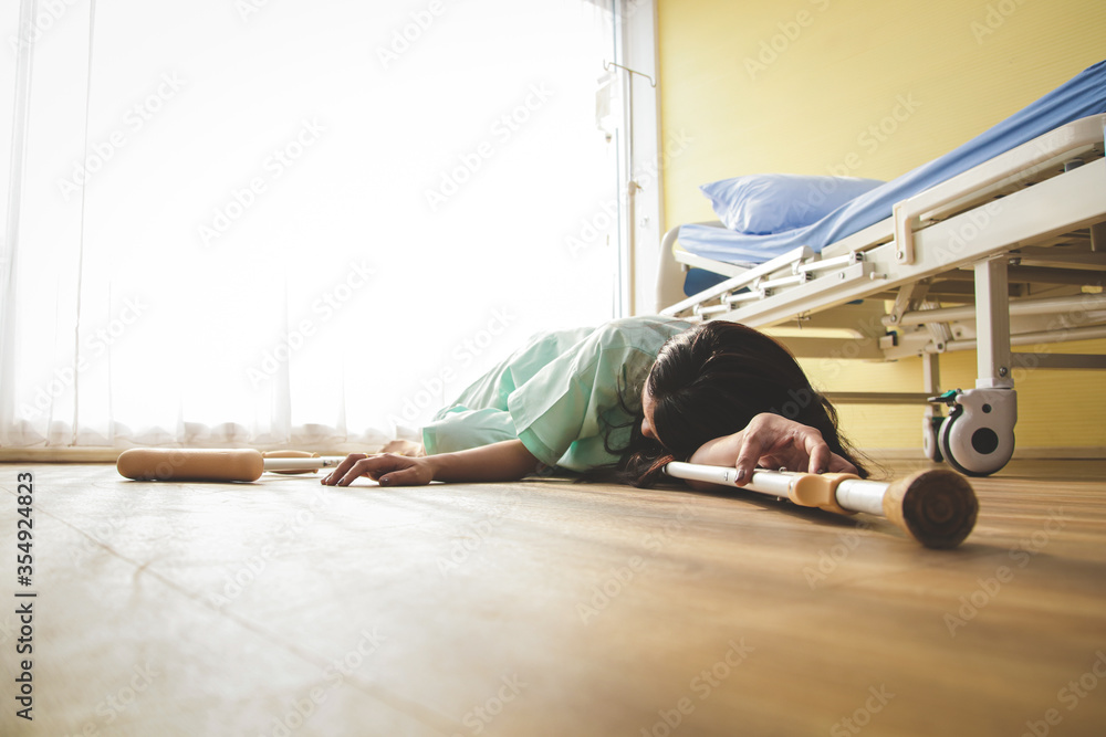 The female patient fell on the floor beside the bed in the recovery ...