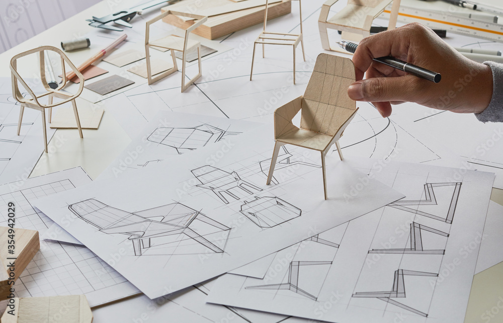 Designer sketching drawing design development product plan draft chair ...