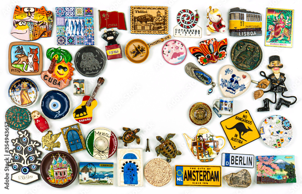 Souvenirs of different countries of the world on white background with ...