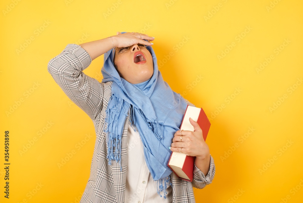 Shocked panic young muslim woman wearing hijab, holding hands on face ...