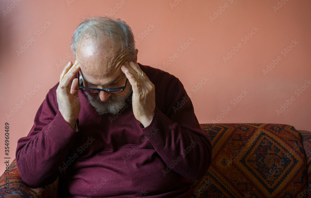 Old man with headache. Elderly senior man has headache. Unhappy ...