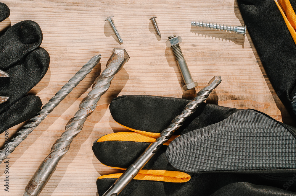 Building tools including centimeter ruler, wrench and cutter placed in ...