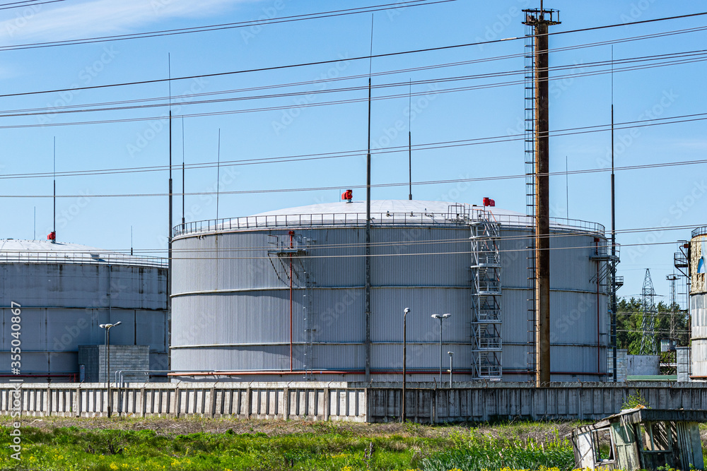 Industrial natural gas storage tanks. Gas tank in petroleum refinery ...