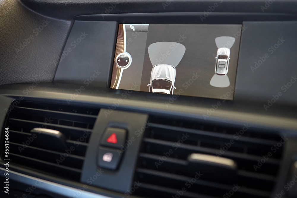 Interior of premium car backup parking assistant system with sensors on ...