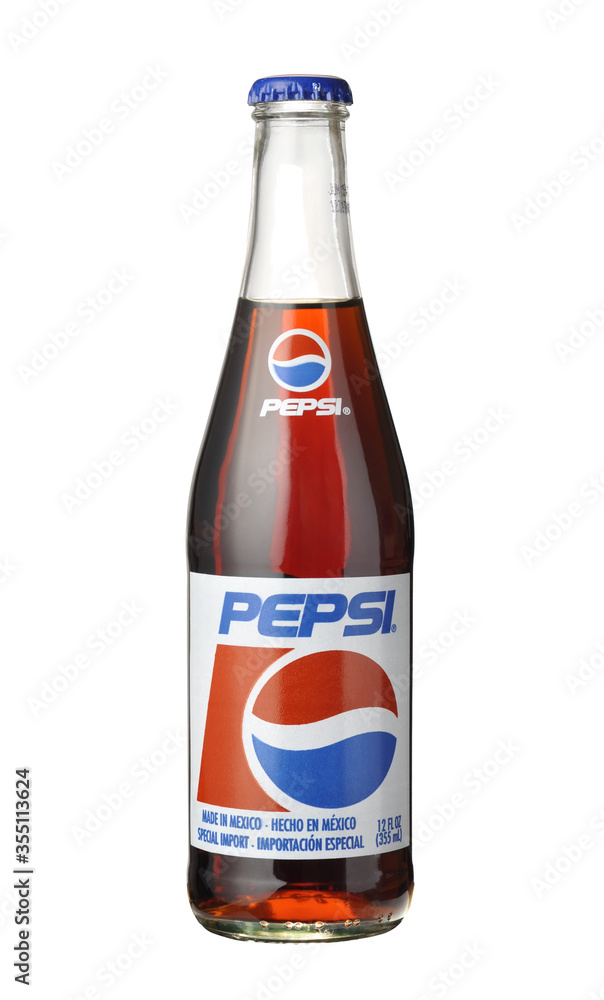Photo of Pepsi glass bottle. Pepsi is a carbonated soft drink that is ...