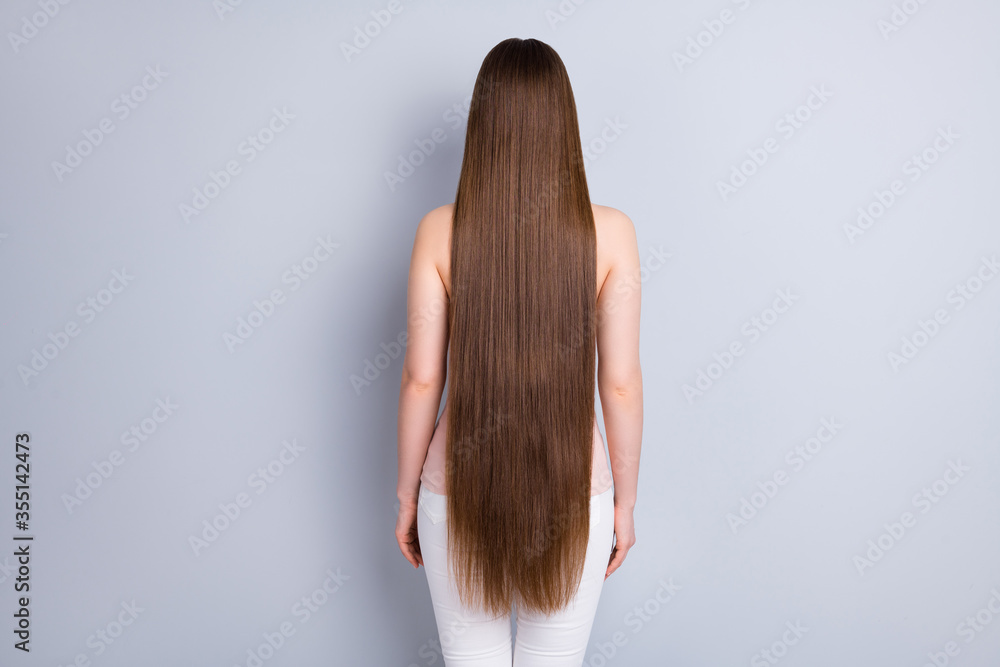 Rear back behind view photo of perfect model lady demonstrating ideal ...