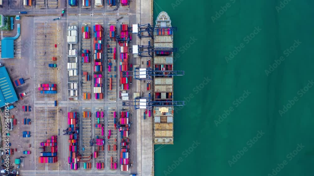 Time lapse 4K, Aerial top view Container cargo freight ship with ...