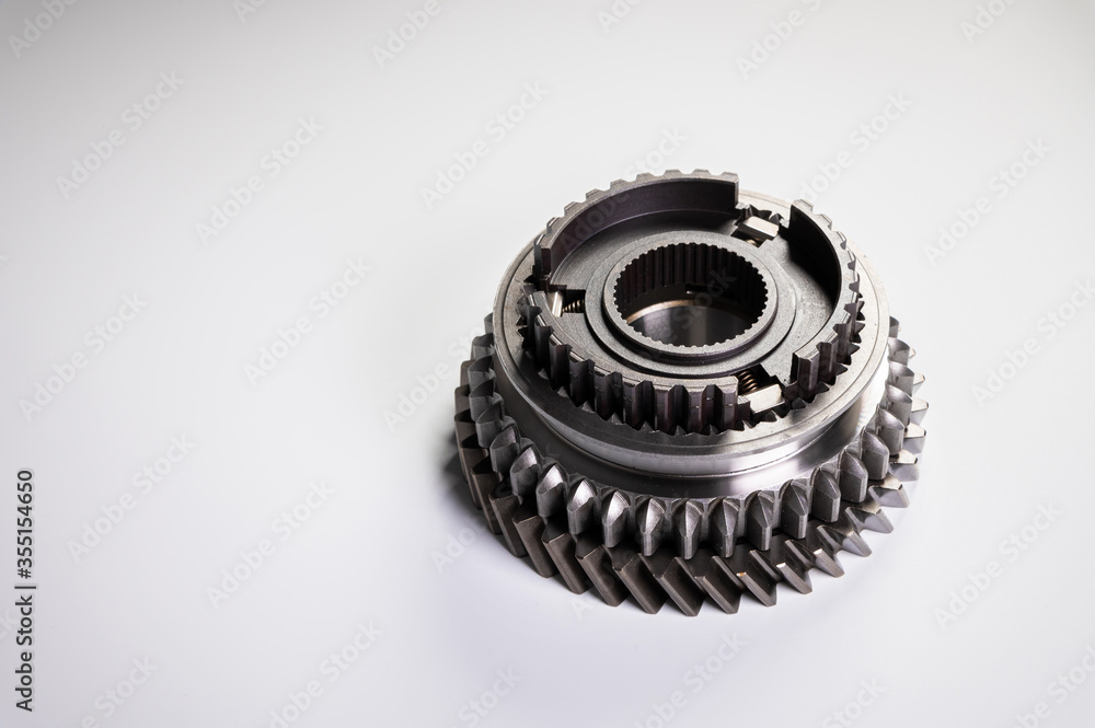 New parts on a gray background. Gears of gear shifting torque ...