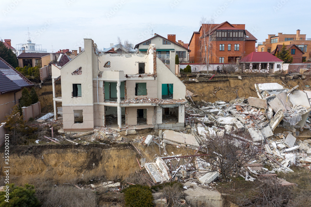 Landslide caused by rains of hurricane destroyed expensive cottages and ...