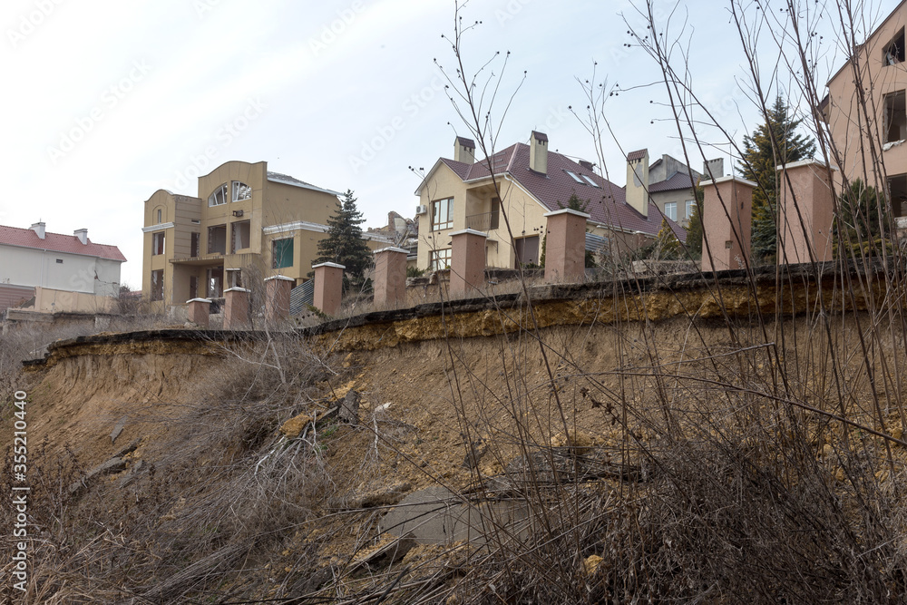 Landslide caused by rains of hurricane destroyed expensive cottages and ...
