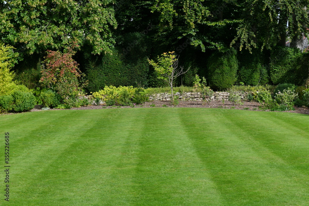Landscape View of a Beautiful English Style Garden with a Fresh Mowed ...