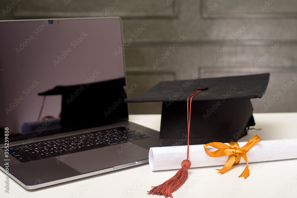 Graduation cap with laptop computer , Online education concept Stock ...