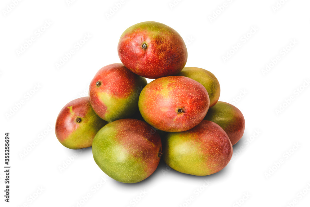 pyramid-shaped pile of fresh bright mangoes on a white background Stock ...